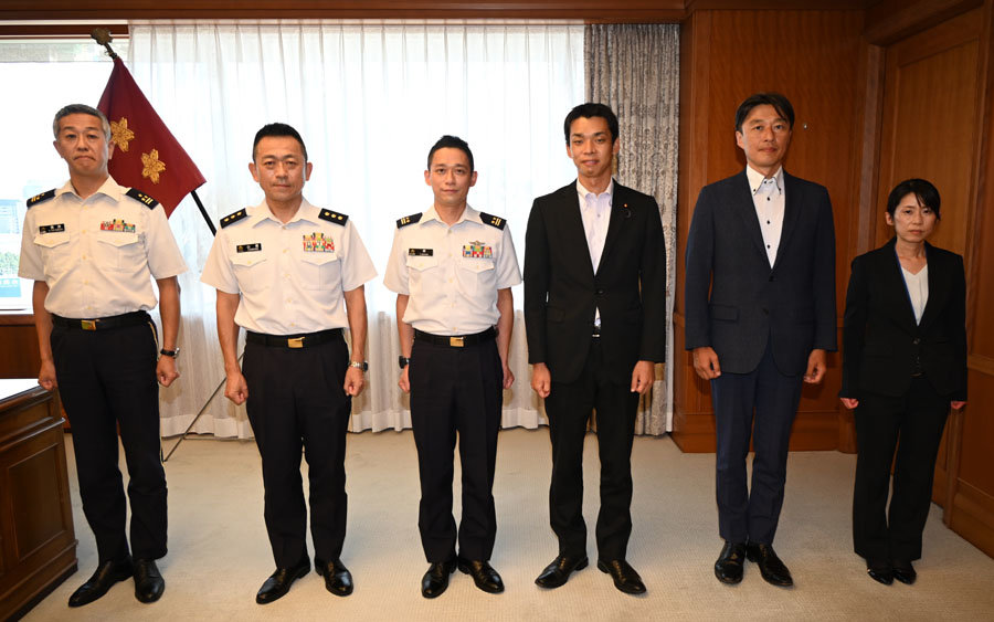 State Minister of Defense Ino received a report from LtCol Minami upon ...